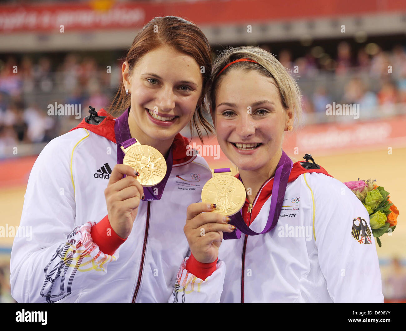 Germany's Miriam Welte (L) and Kristina Vogel celebrates her gold medal ...