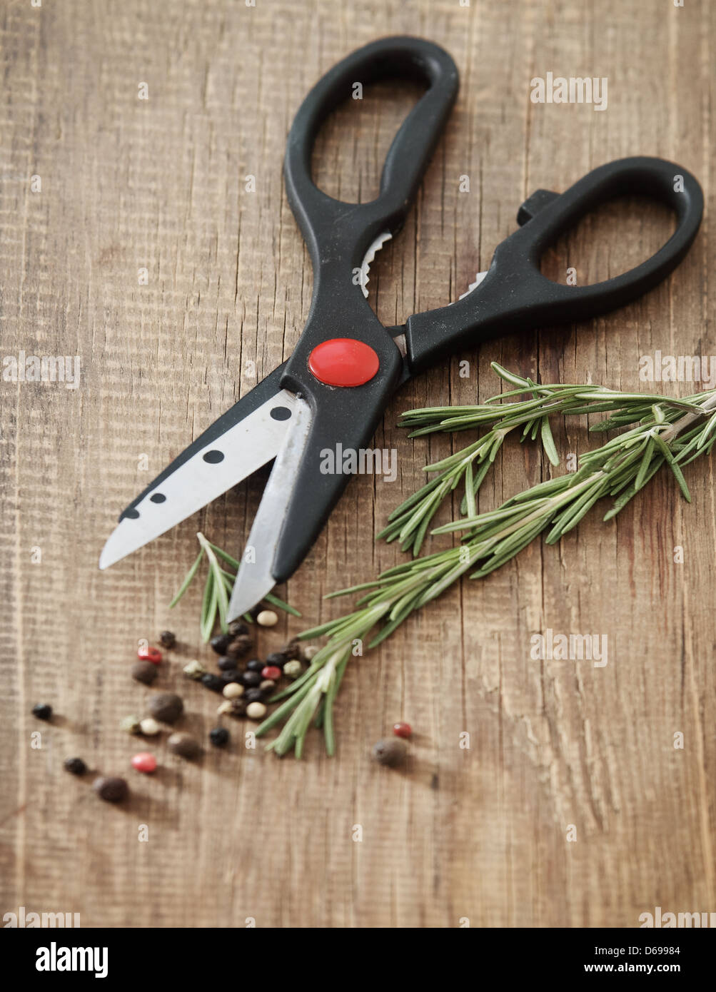 Still life with fresh rosemary and scissors Stock Photo - Alamy