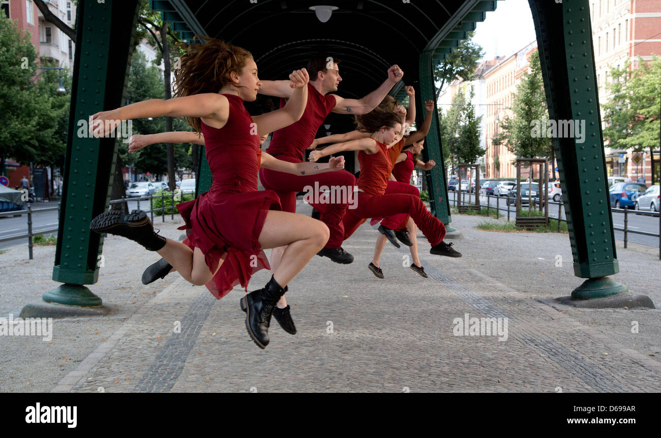 A dance group of Isabel/Jon & Company rehearses on a public street at ...