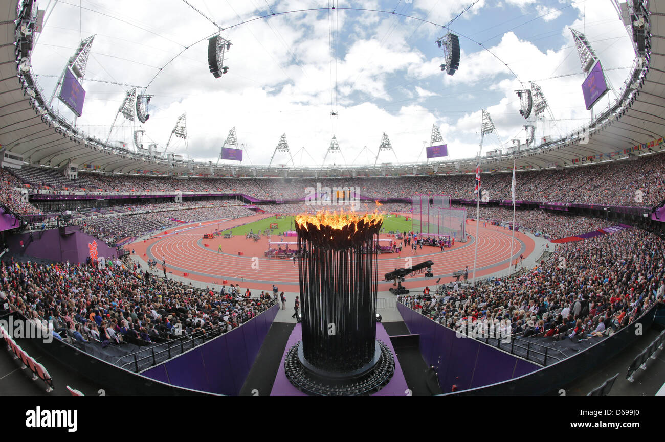 The Olympic flame is seen in the Olympic stadium during the London 2012 ...