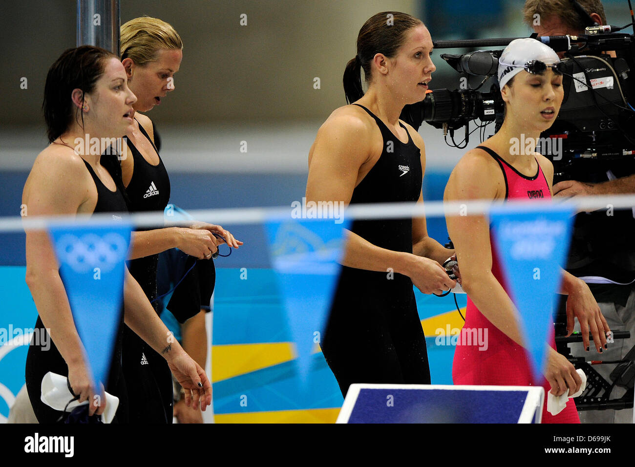 Germany's Sarah Poewe (L-R), Britta Steffen, and Alexandra Wenk reacts ...
