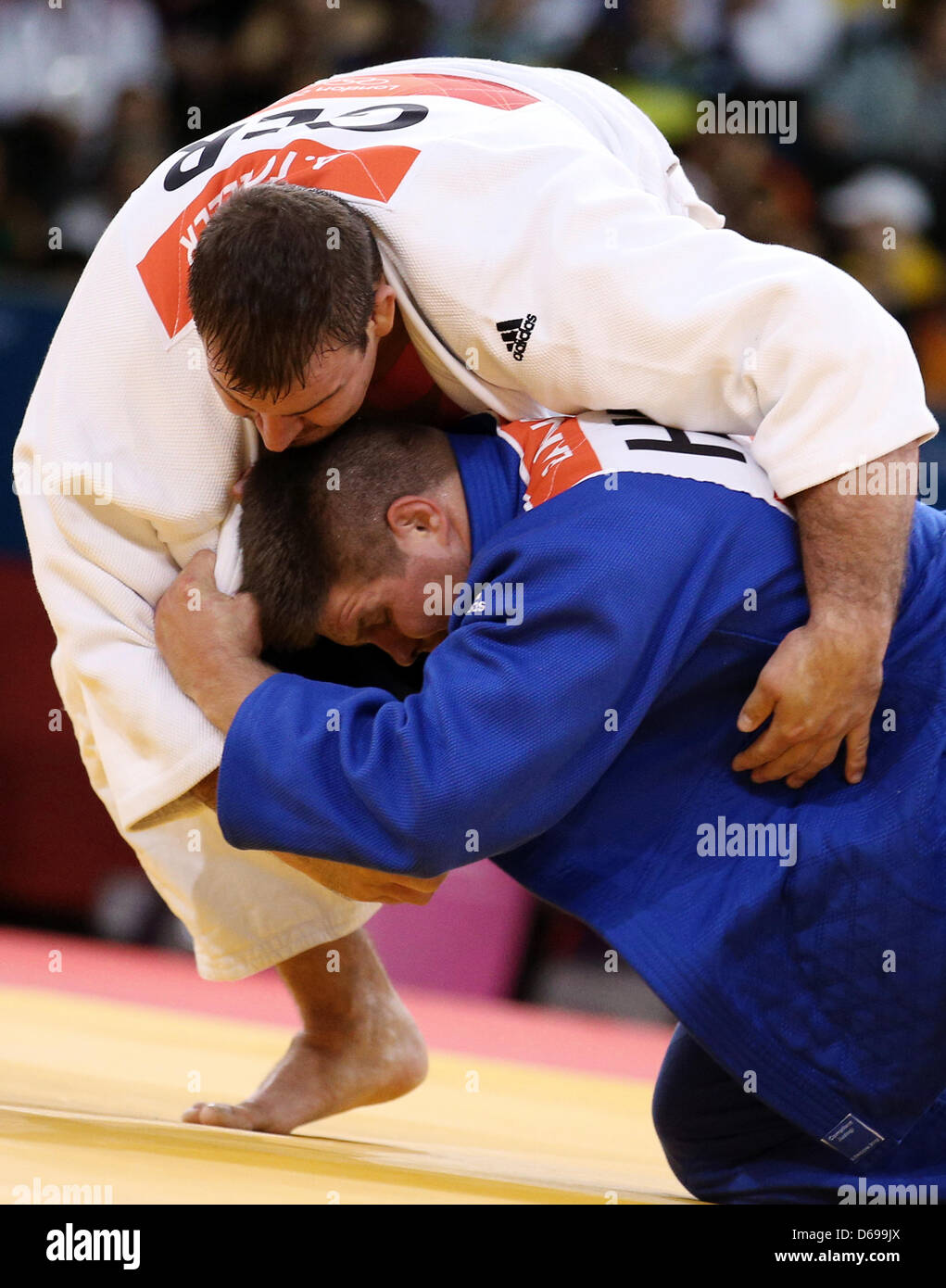 German judoka Andreas Toelzer (L) fights against Barna Bor of Hungary ...