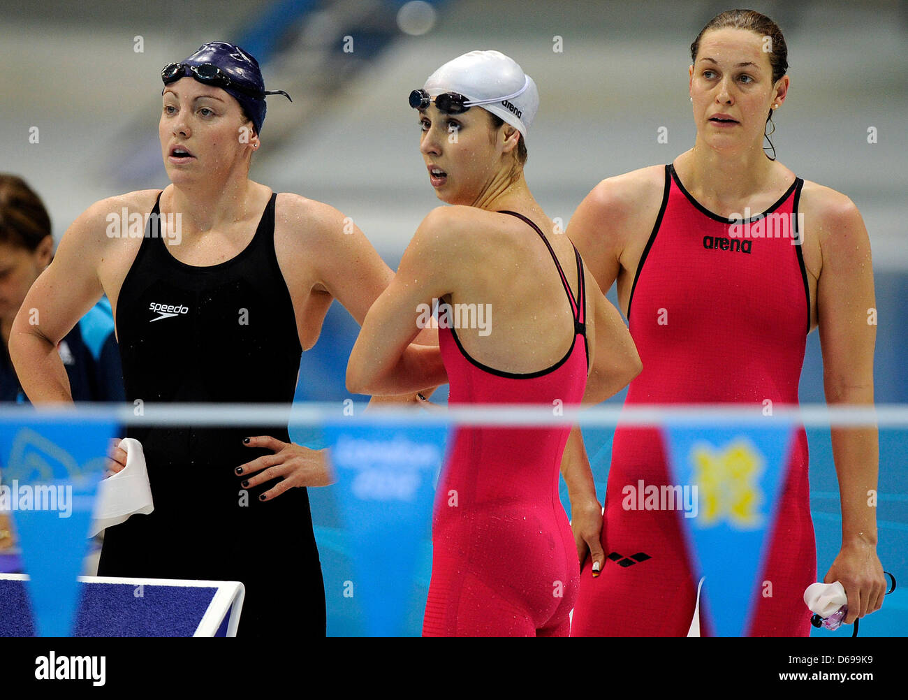 Germany's Sarah Poewe (L-R) , Alexandra Wenk and Jenny Mensing react ...