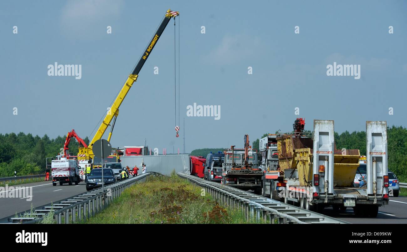 A truck lies on the guardrail of motorway A38 after an accident in ...