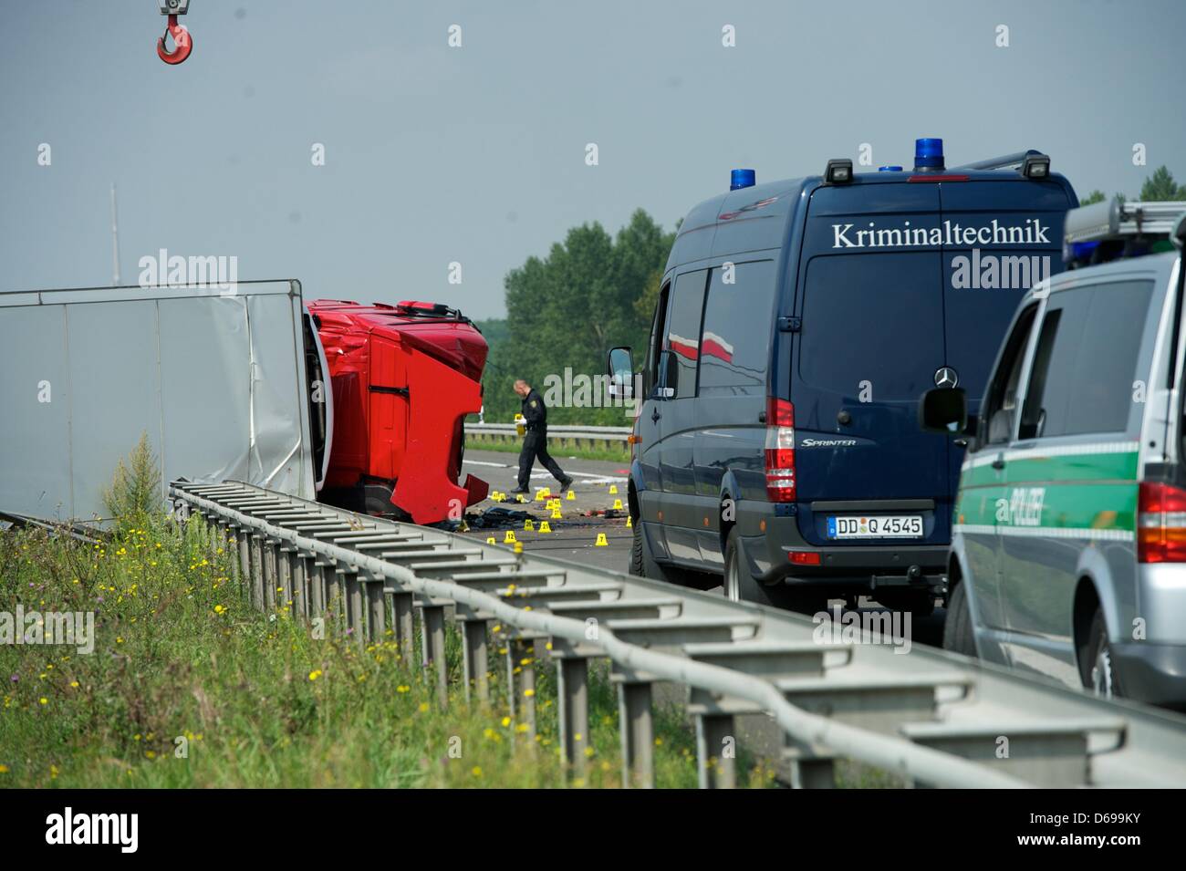 A truck lies on the guardrail of motorway A38 after an accident in ...