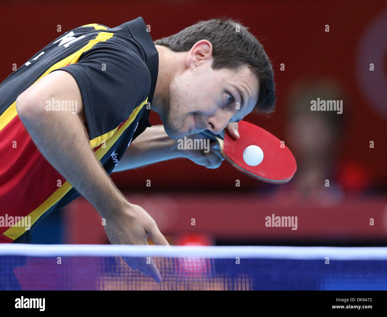 Timo Boll of Germany in action againt during the Men's Team First Round ...