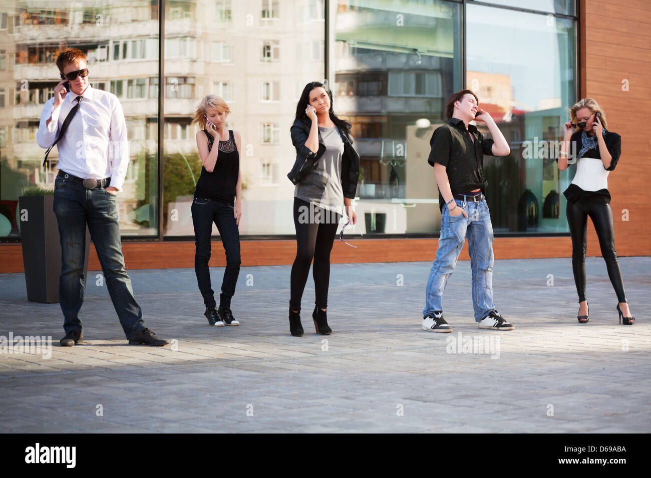 Young people calling on the mobile phones Stock Photo - Alamy