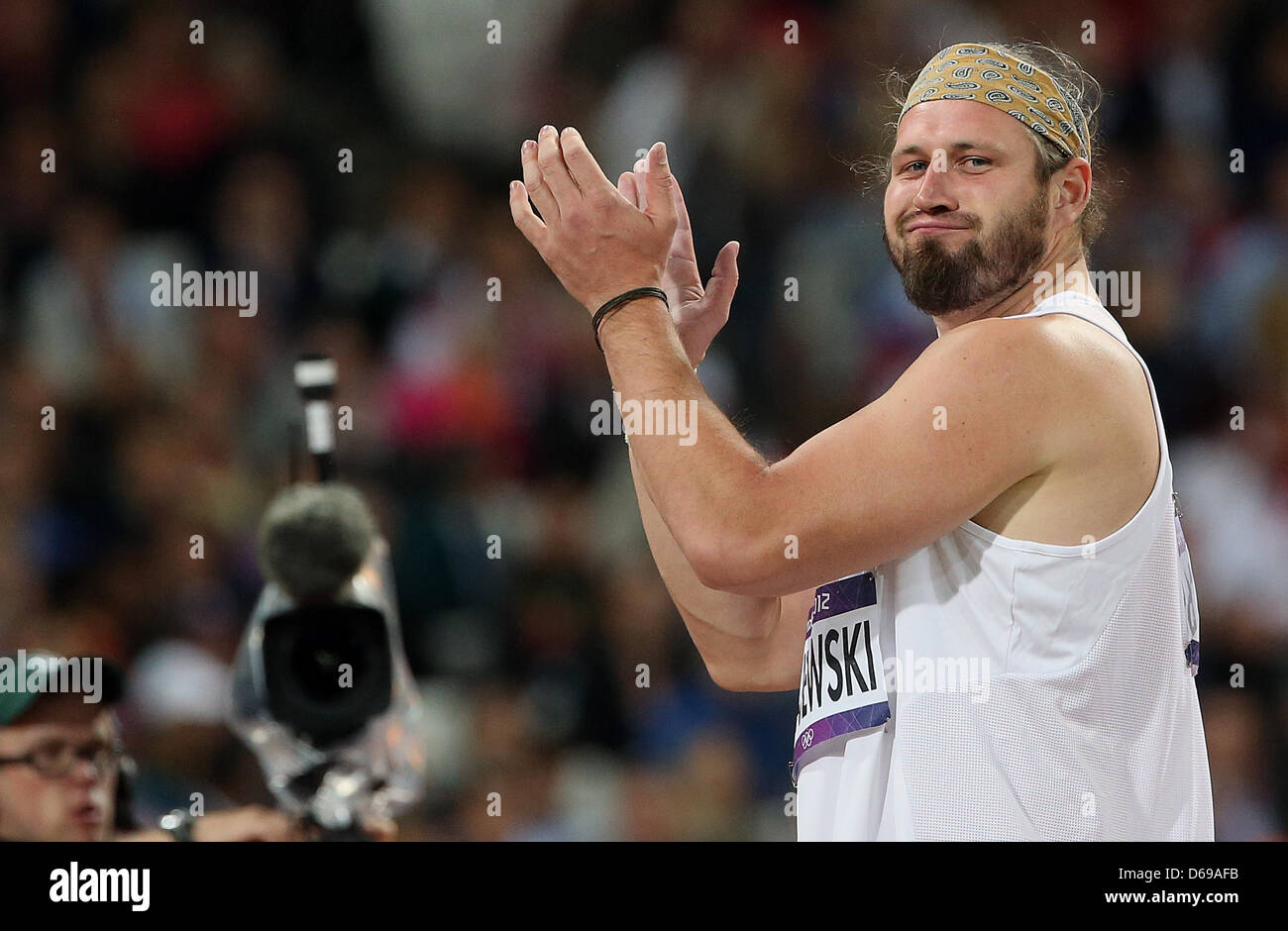 Tomasz Majewski of Poland celebrates after winning the gold medal in ...