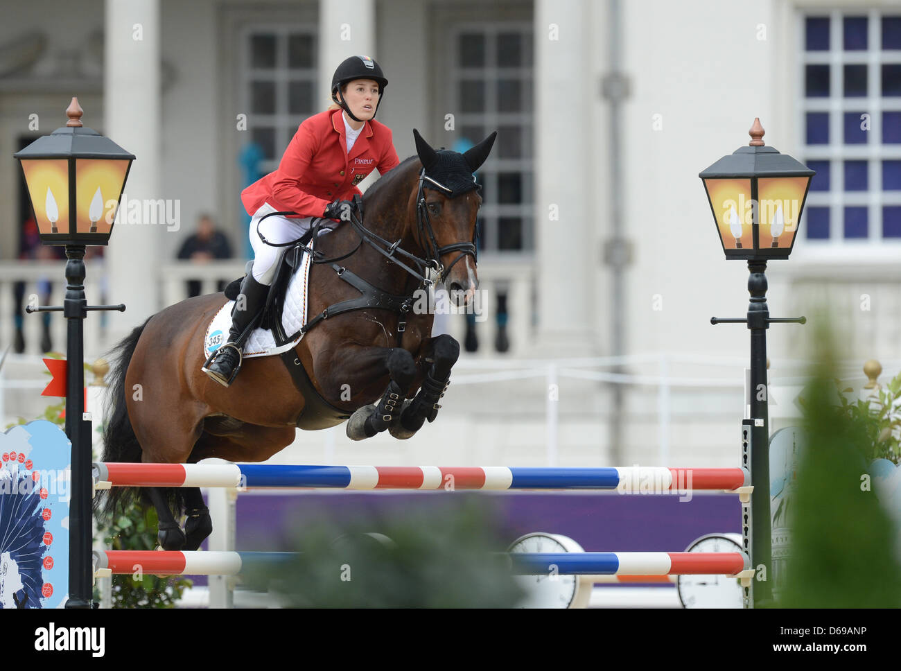 Germany's jumping rider Janne Friederike Meyer jumps with her horse ...