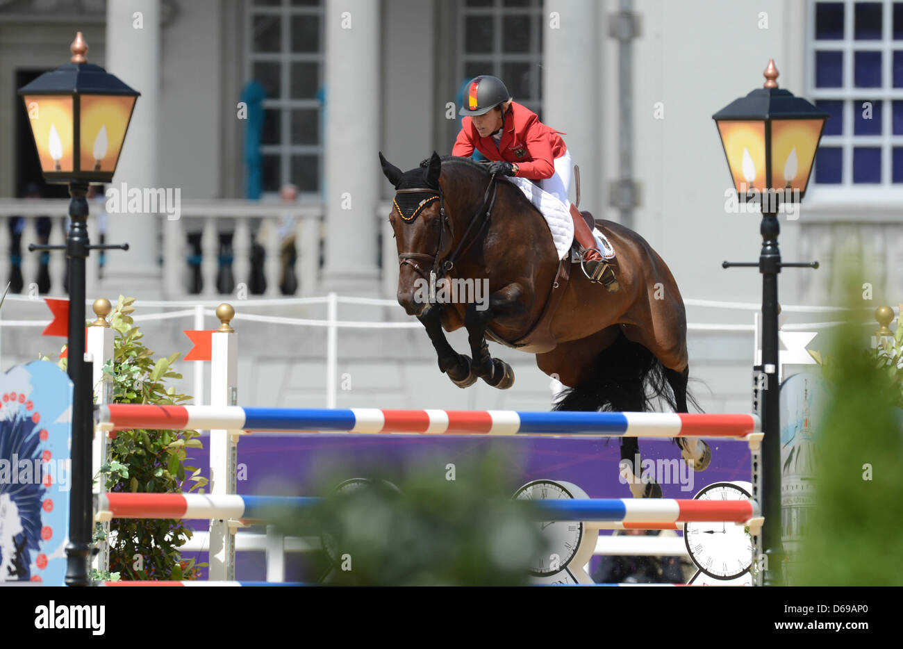 Germany's jumping rider Meredith Michaels-Beerbaum jumps with her horse ...