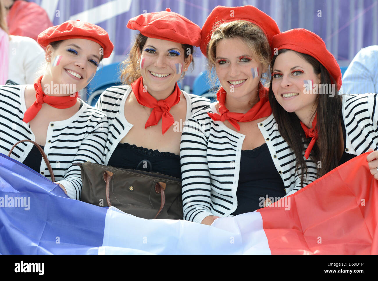 French equestrian fans pose for a photo at the olympic jumping ...