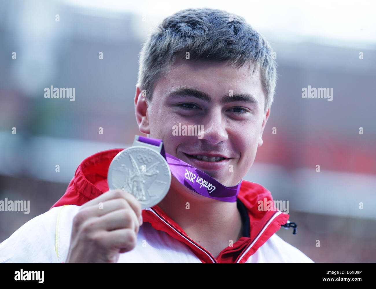 Germany's David Storl shows his silver medal during the medal ceremony ...