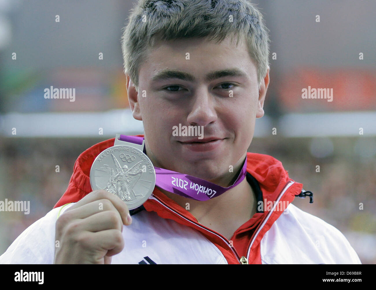 Germany's David Storl shows his silver medal during the medal ceremony ...
