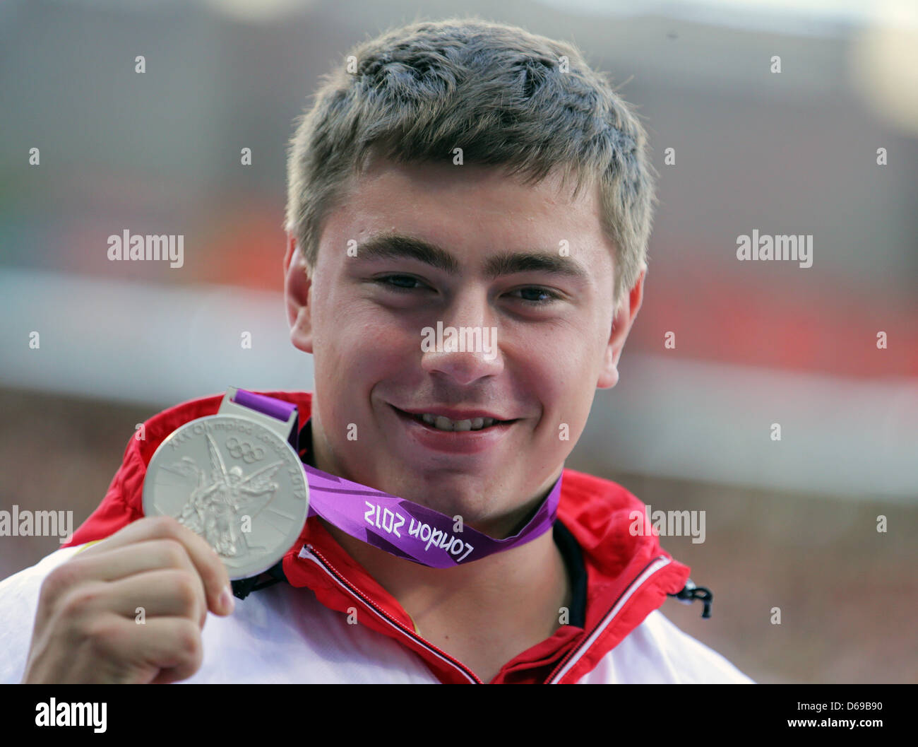 Germany's David Storl shows his silver medal during the medal ceremony ...