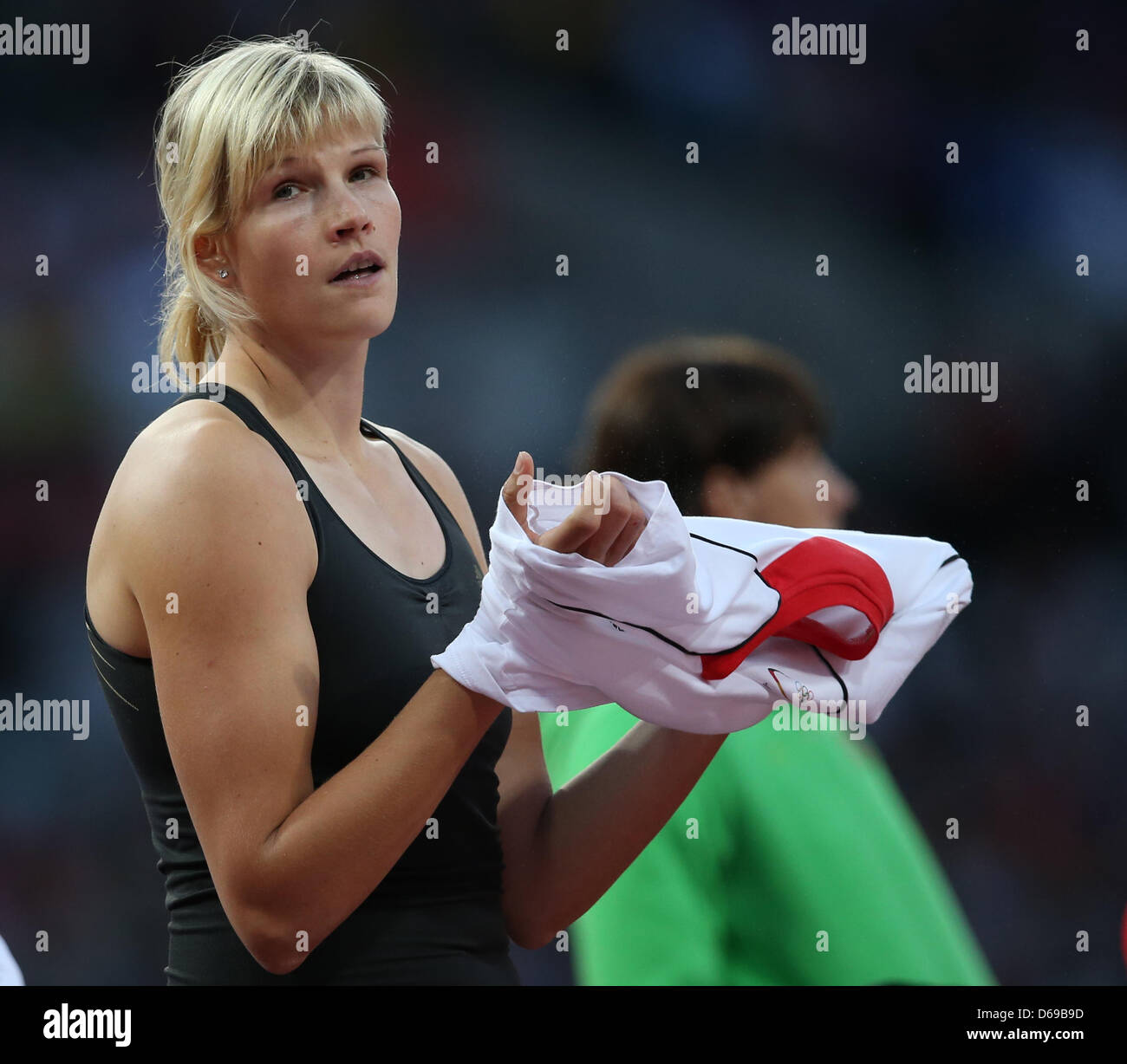 Nadine Mueller of Germany reacts during the Women's Discus Throw final ...