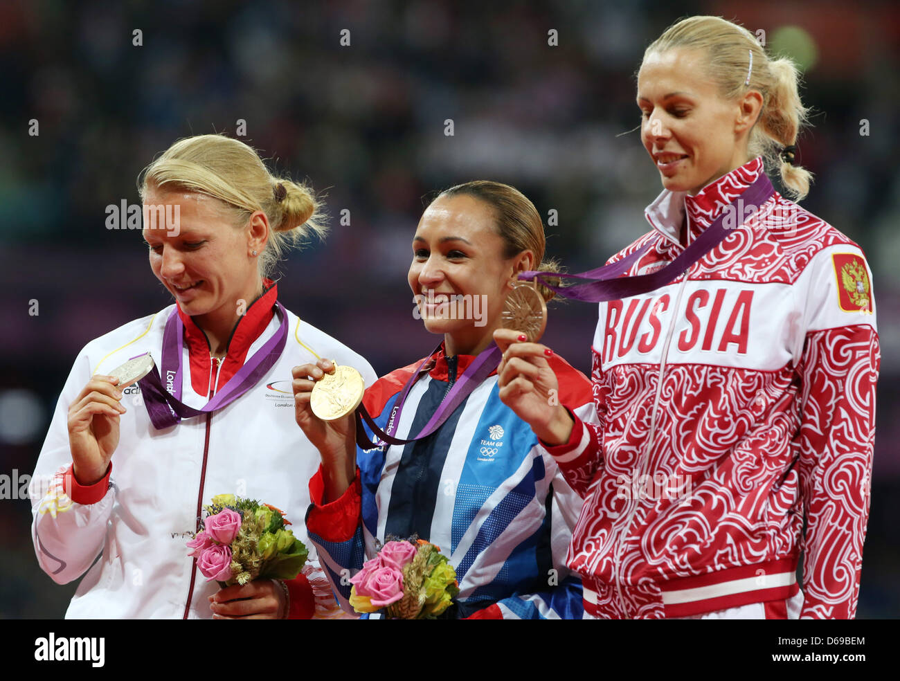 Bronze medalist Tatyana Chernova of Russia (R-L), gold medalist Jessica ...