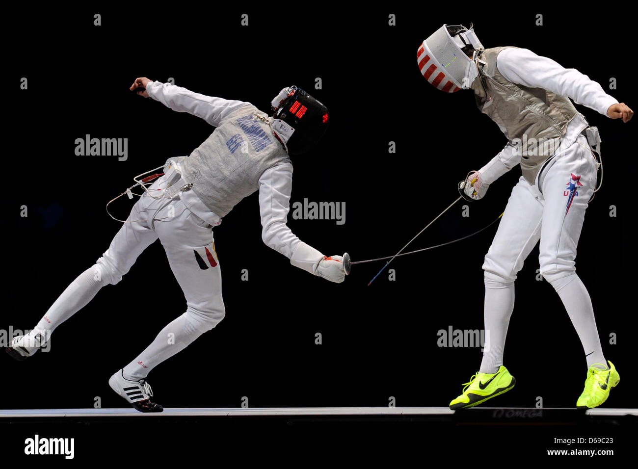 Germany's Sebastian Bachmann (L) competes with Alexander Massialas of ...