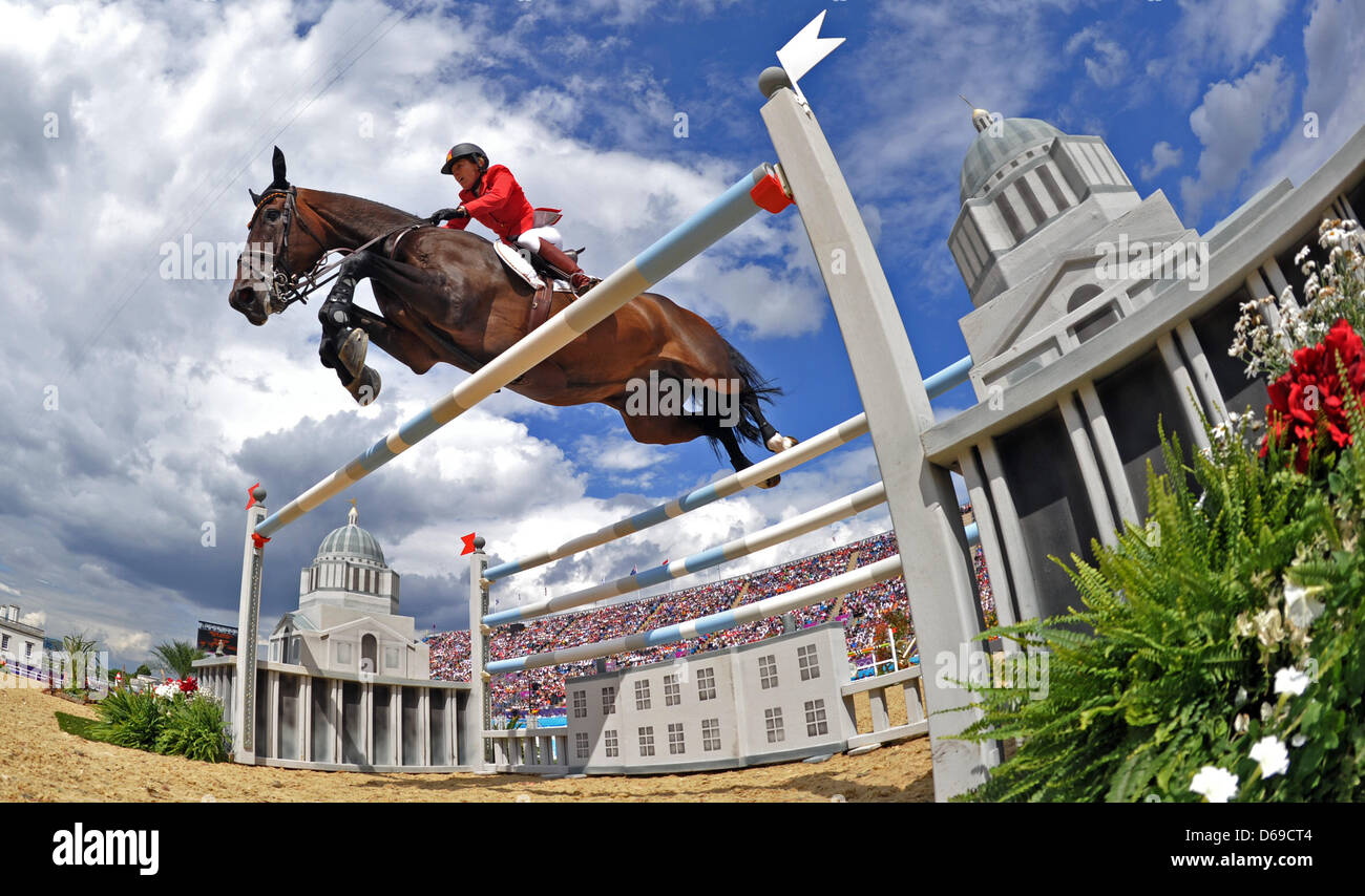 Germany's jumping rider Meredith Michaels-Beerbaum jumps with her horse ...