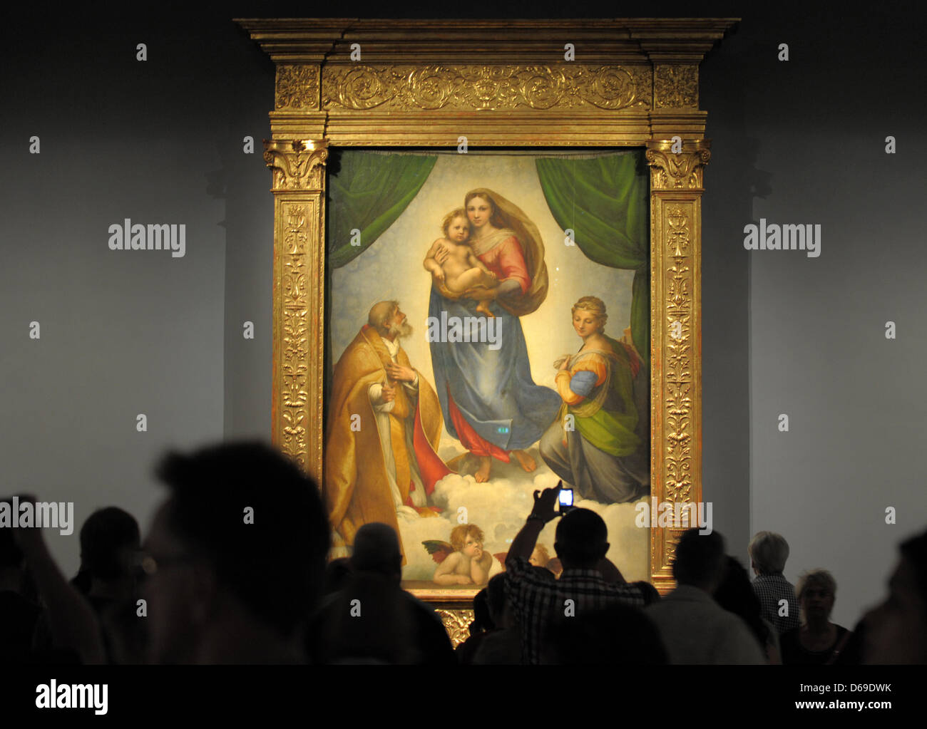 Visitors view Raphael's Sistine Madonna at the Old Masters Picture ...