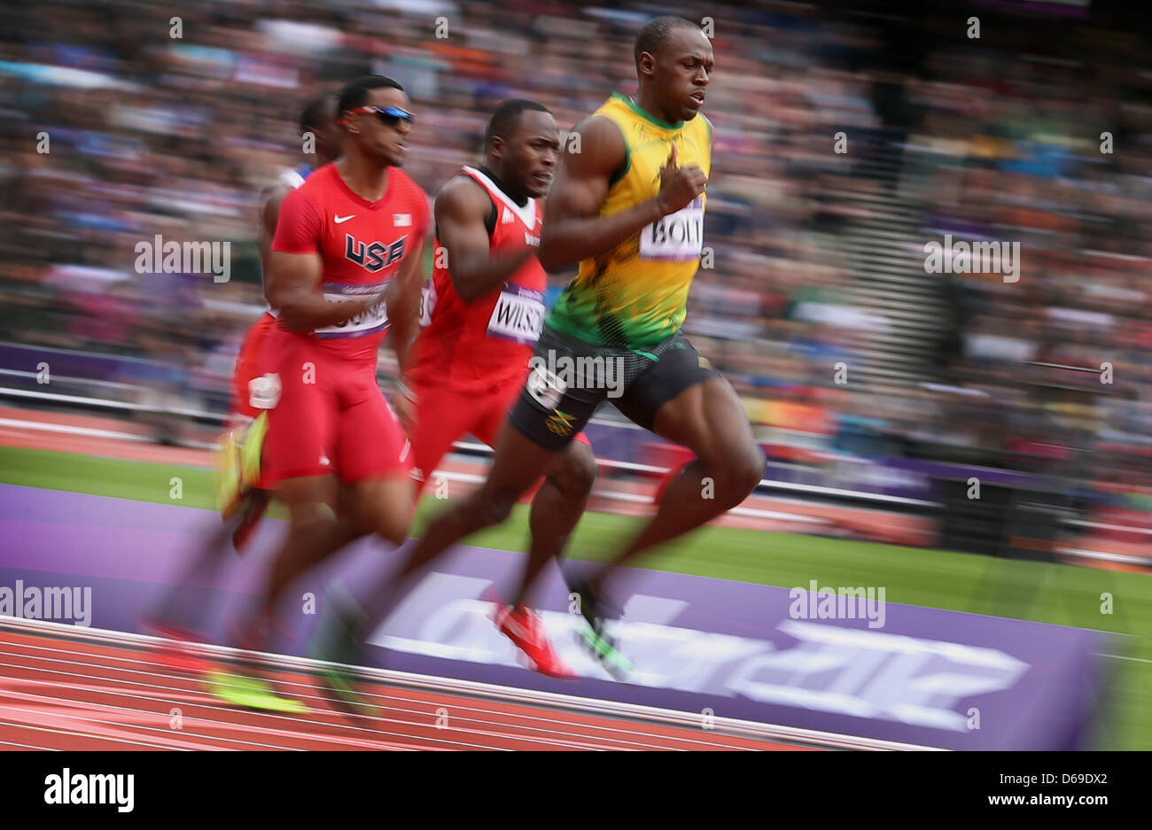 Usain Bolt (R) of Jamaica, Alex Wilson of Switzerland and Isiah Young ...