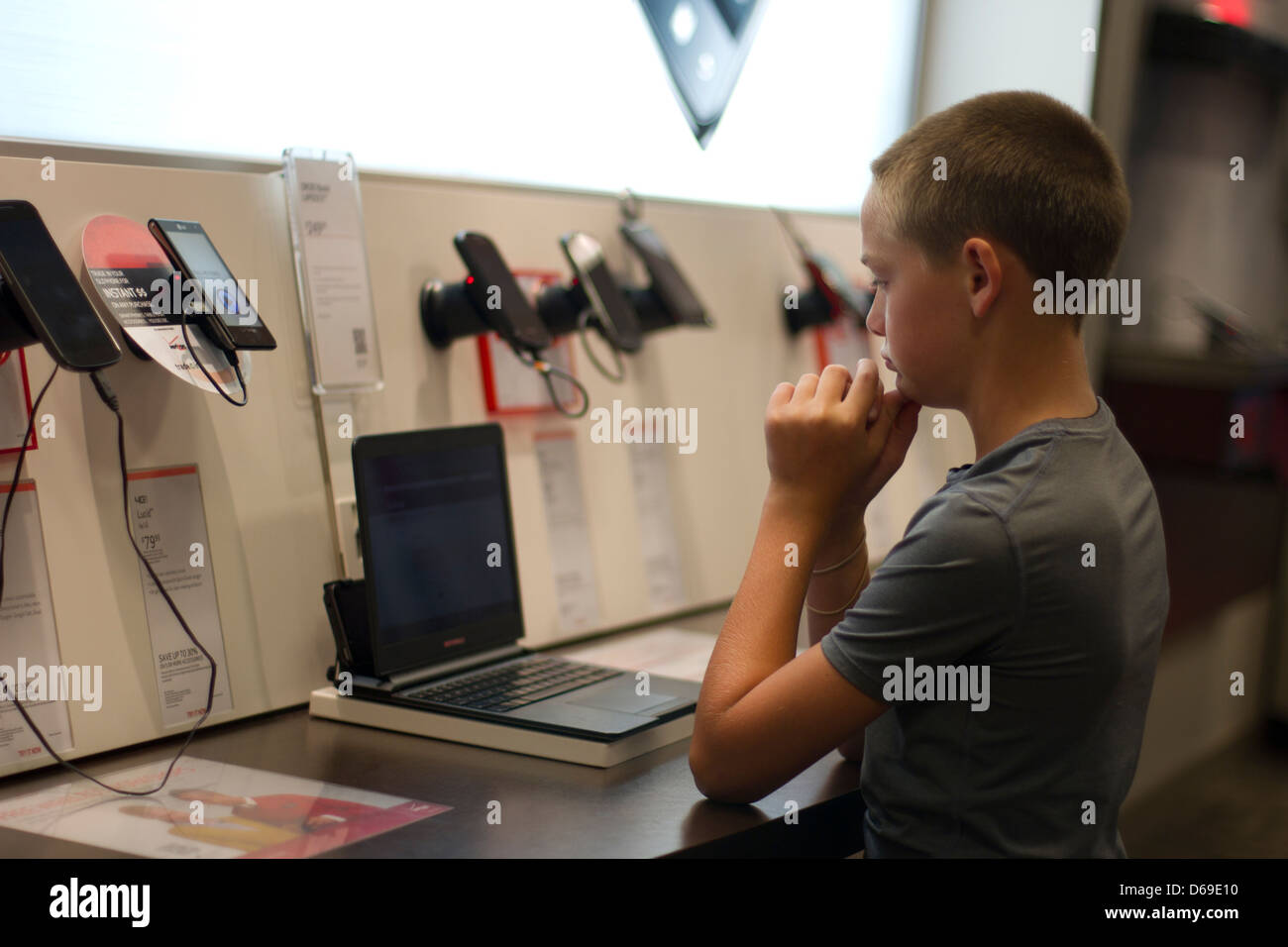 Child playing on a computer Stock Photo - Alamy