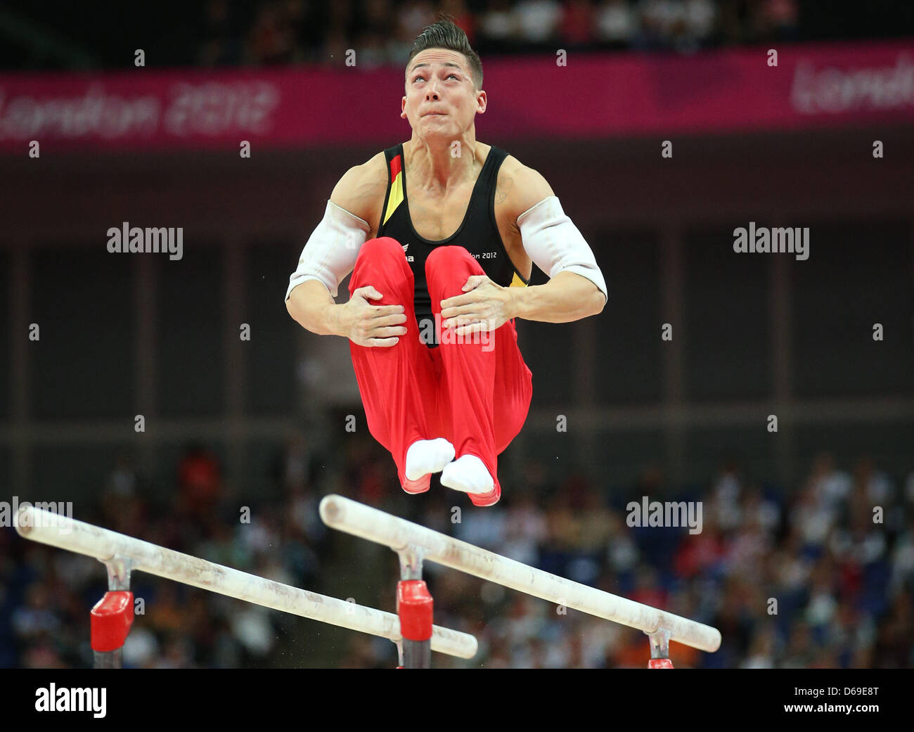 Germany's Marcel Nguyen competes in the Men's Parallel Bars event ...