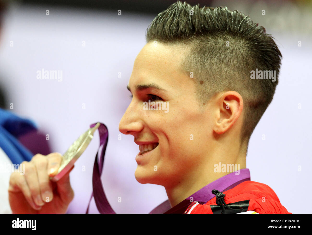 Germany's Marcel Nguyen celebrates after winning the silver medal in ...