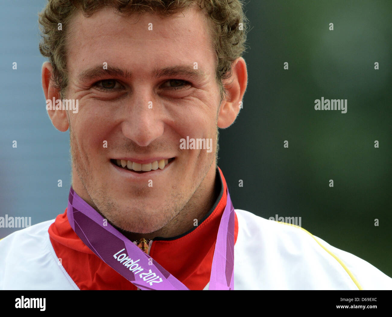 Sebastian Brendel of Germany celebrates with his gold medal after the ...