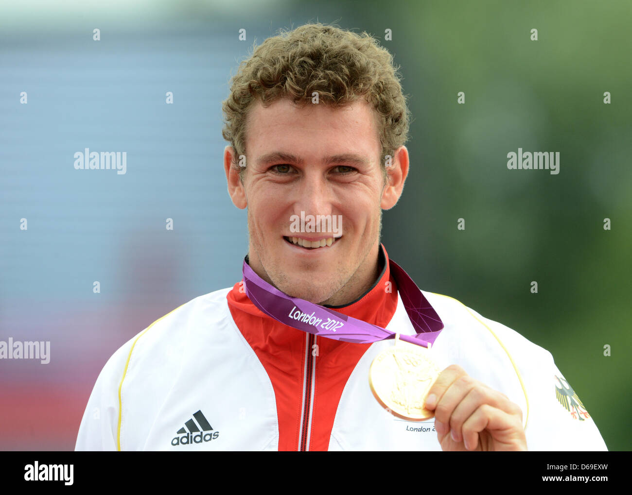Sebastian Brendel of Germany celebrates with his gold medal after the ...