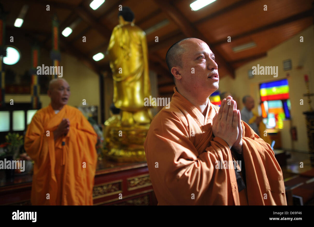 Buddhist monks pray in the Buddhist monastery 'Pagode Vien Giac' in ...