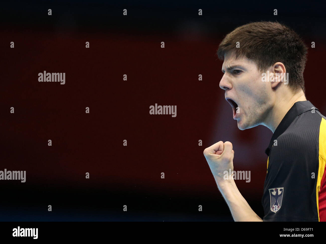 Germany's Dimitrij Ovtcharov competes against Peng Tang of Hong Kong ...