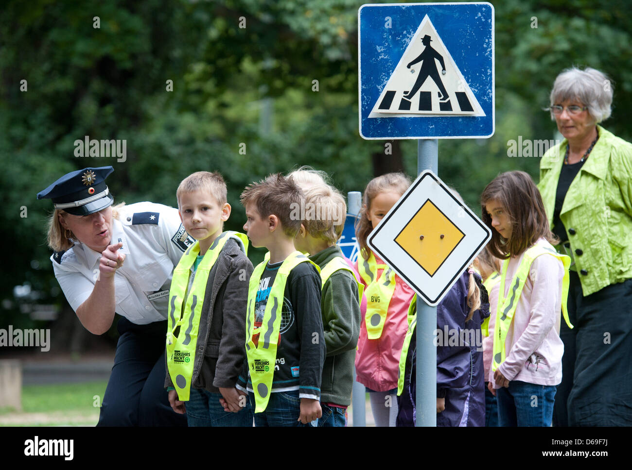Children just starting school practice correct traffic behaviour at the ...