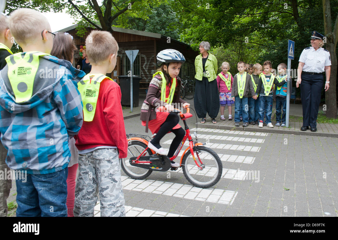 Children just starting school practice correct traffic behaviour at the ...