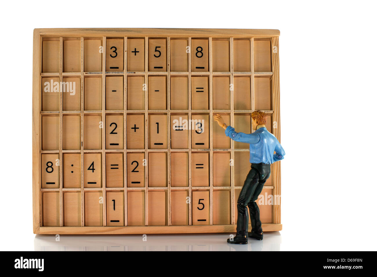 teacher with wooden education board Stock Photo - Alamy