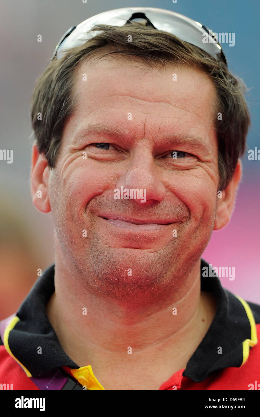 Germany's coach Michael Behrmann smiles after the Women's Hockey ...