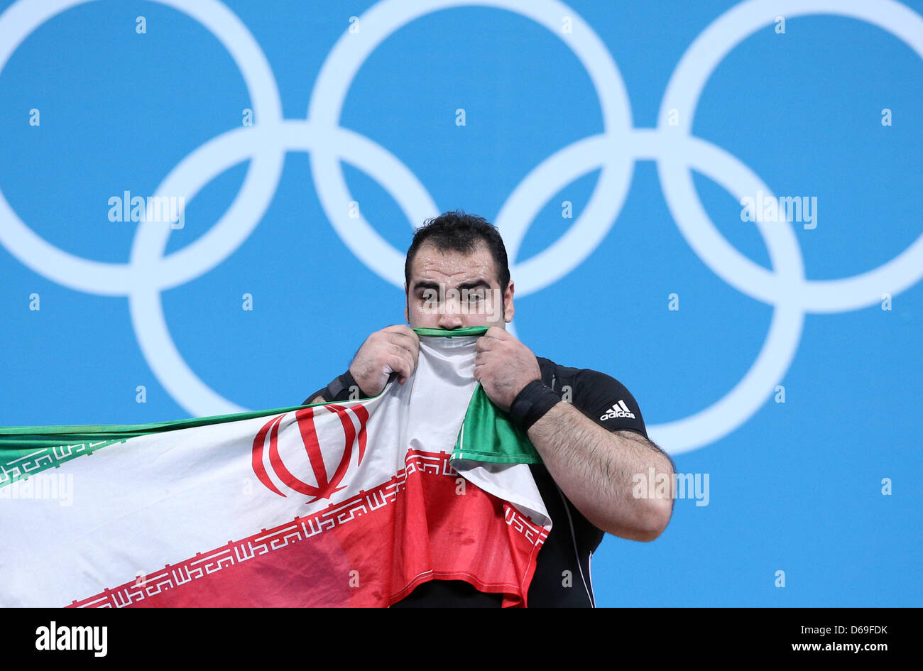 Gold medalist Behdad Salimikordasiabi of Iran celebrates in the ...