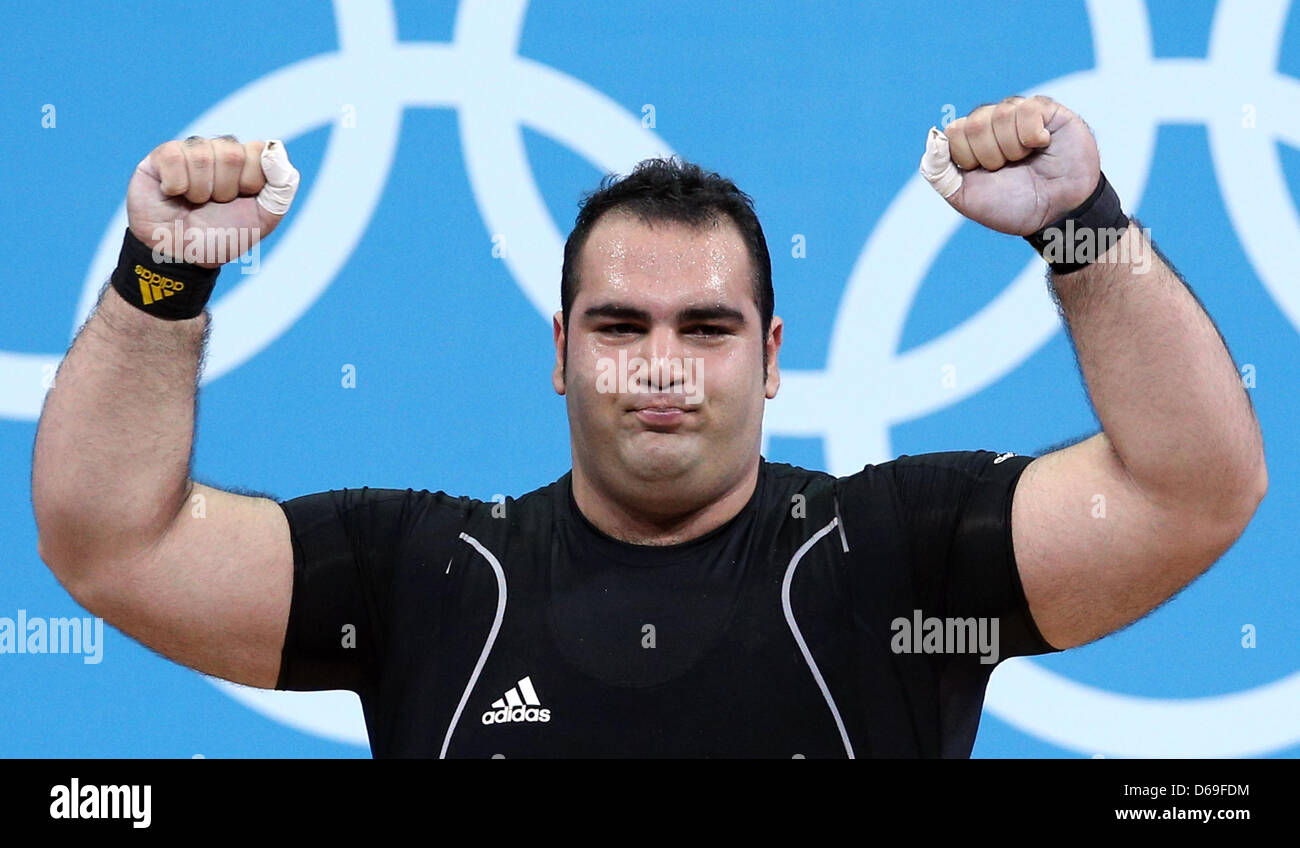 Gold medalist Behdad Salimikordasiabi of Iran celebrates in the ...