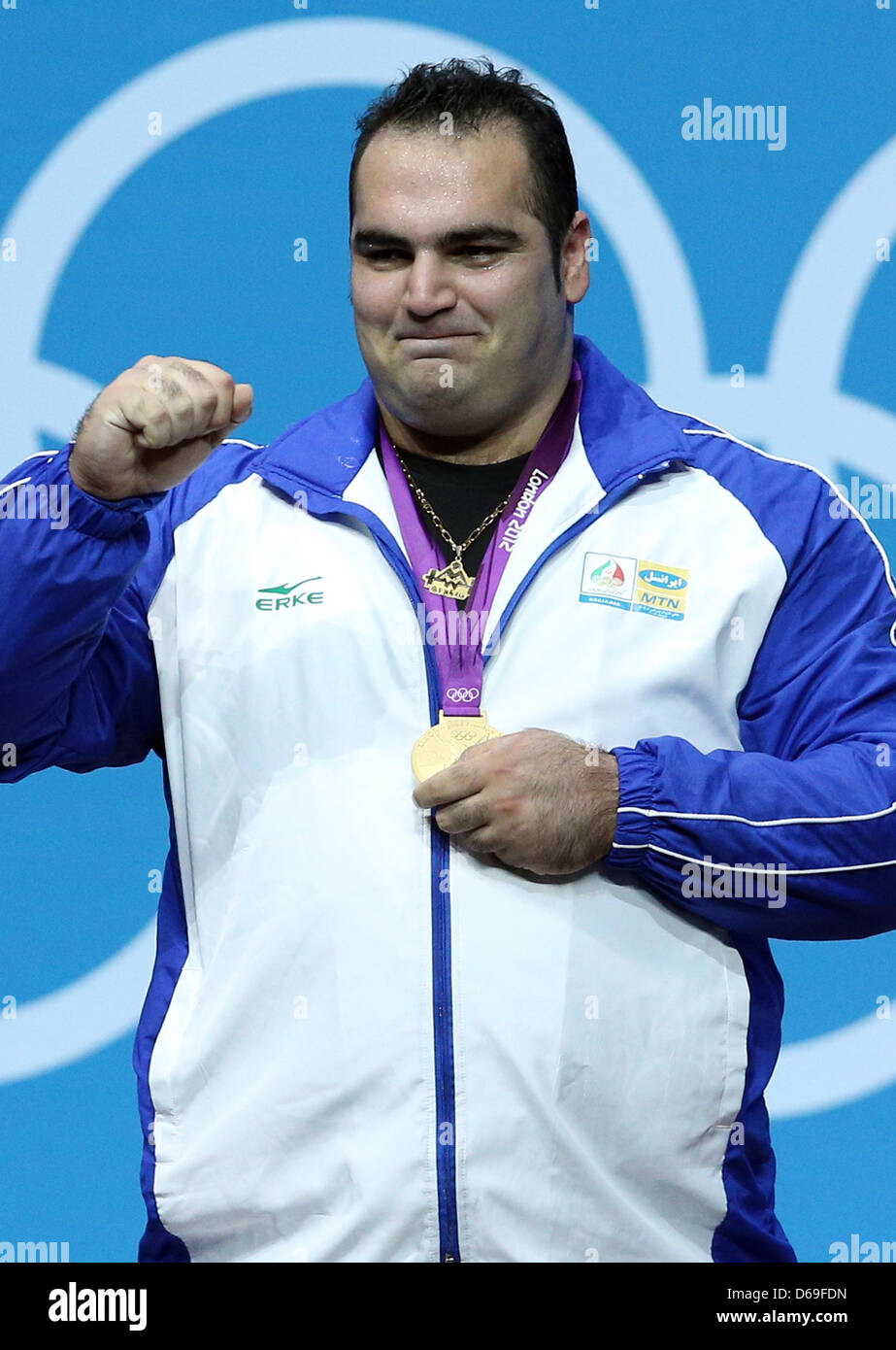 Gold medalist Behdad Salimikordasiabi of Iran celebrates in the ...