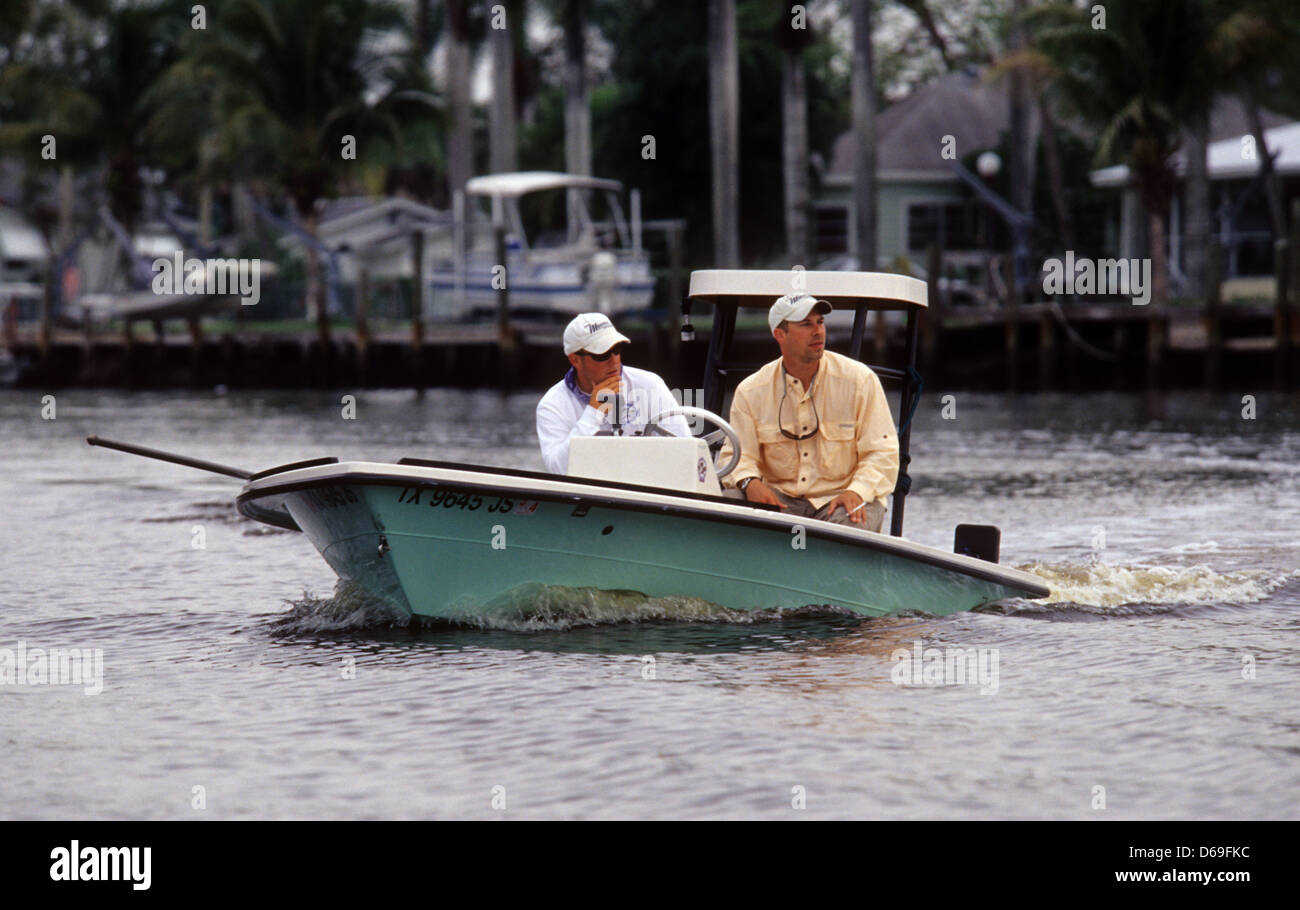 Fly fisherman leaving the dock in Everglades City Florida Stock Photo ...