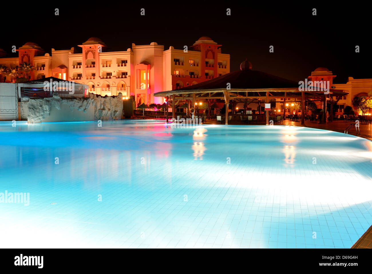 The swimming pool at luxury hotel in night illumination, Hurghada ...