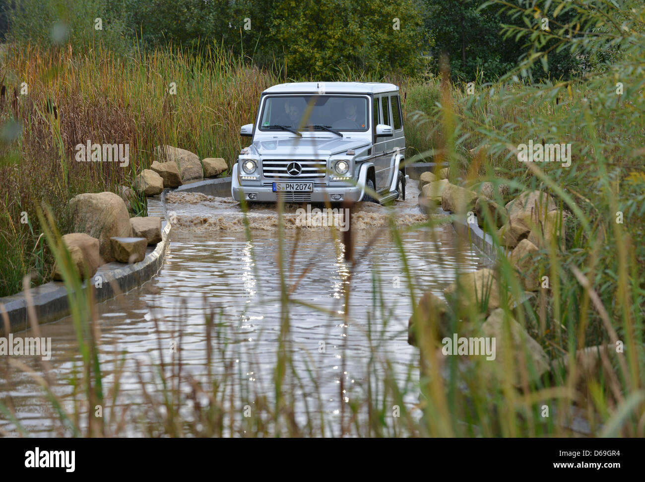 Mercedes G350 AMG G Wagon luxury hard core off road car wading in deep ...