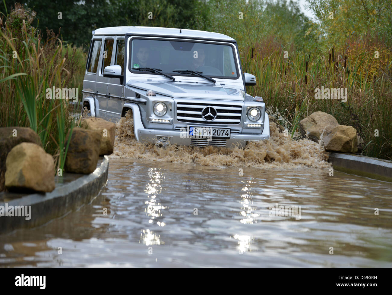 Mercedes G350 AMG G Wagon luxury hard core off road car wading in deep ...