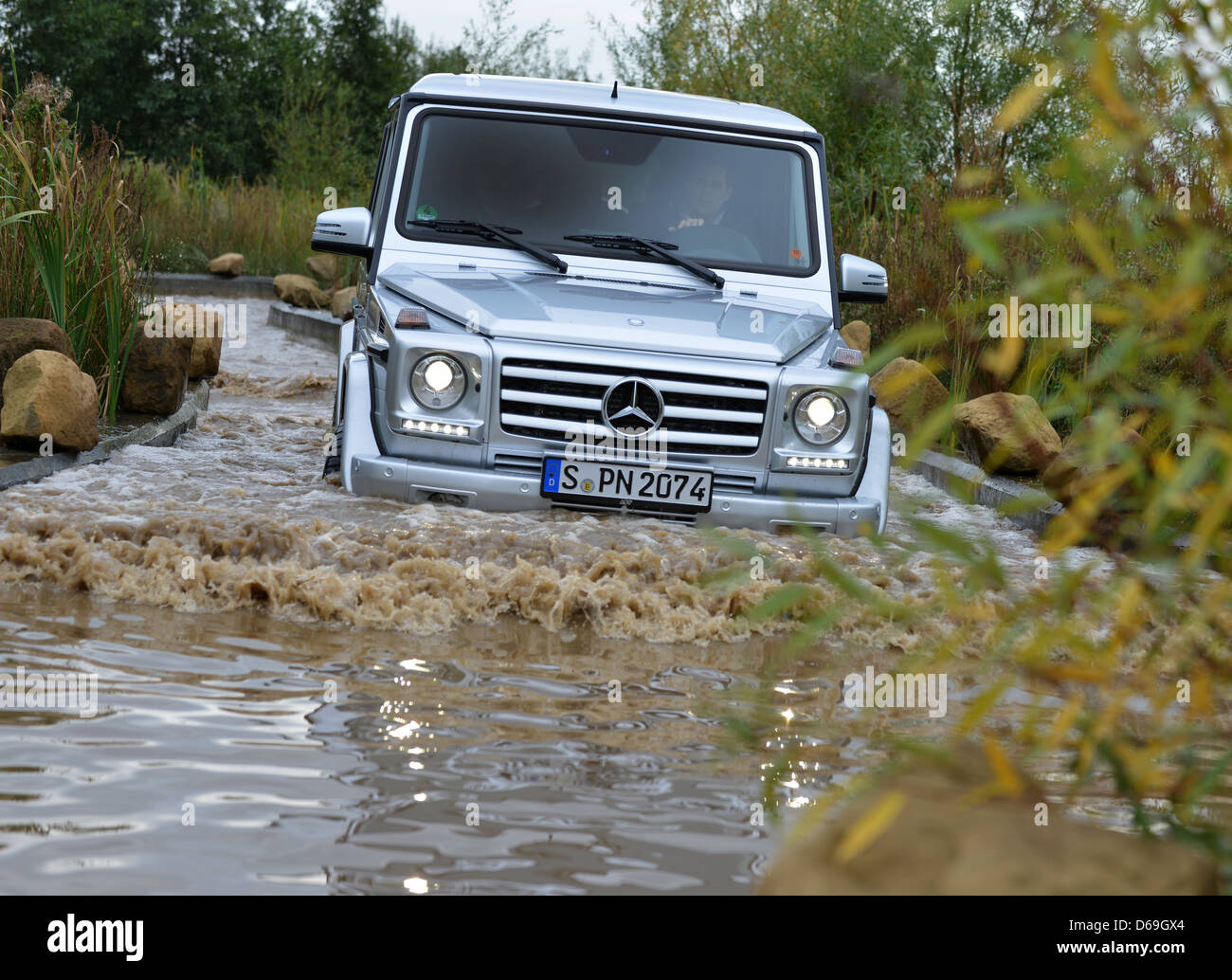 Mercedes G350 AMG G Wagon luxury hard core off road car wading in deep ...
