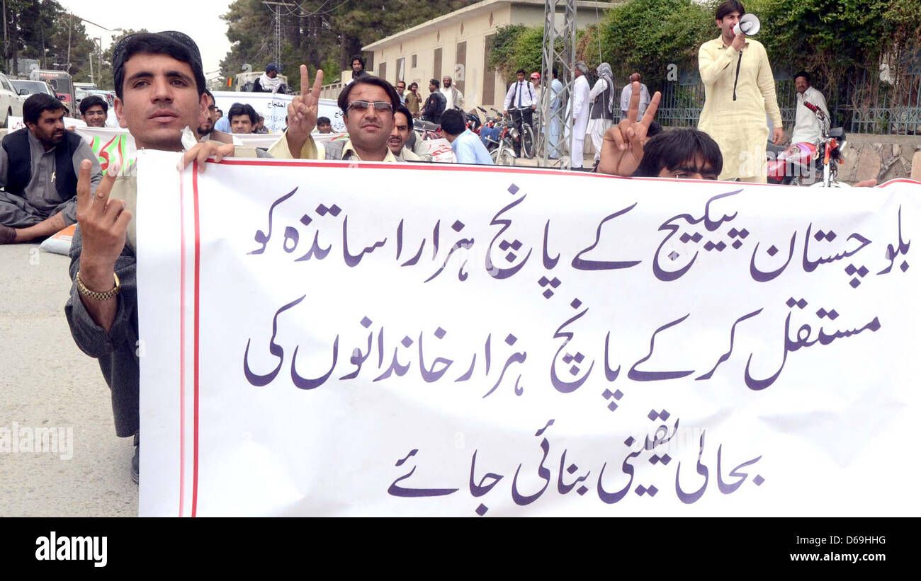 Members of Haqooq Teachers Association chant slogans for regularization ...