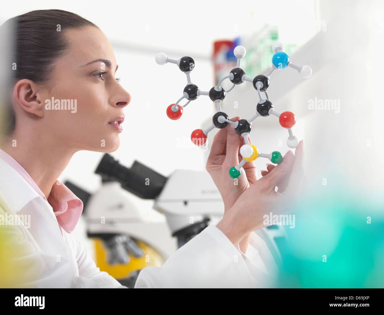 Scientist examining molecular model Stock Photo - Alamy