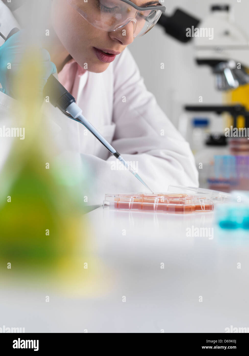 Scientist pipetting vial in hi-res stock photography and images - Alamy