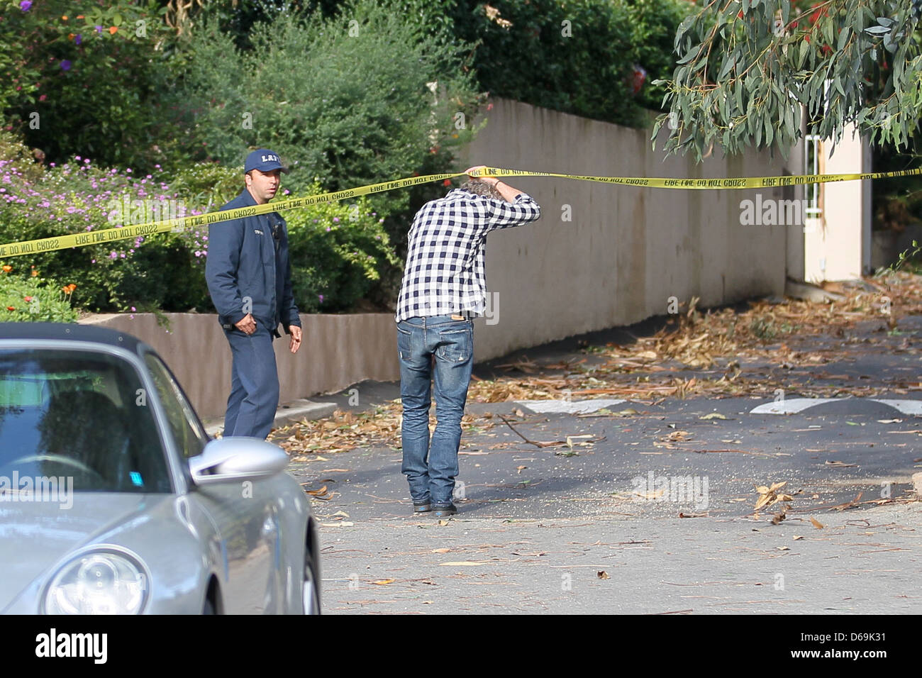 Eric Dane arrives home to find a large tree has fallen and smashed into ...