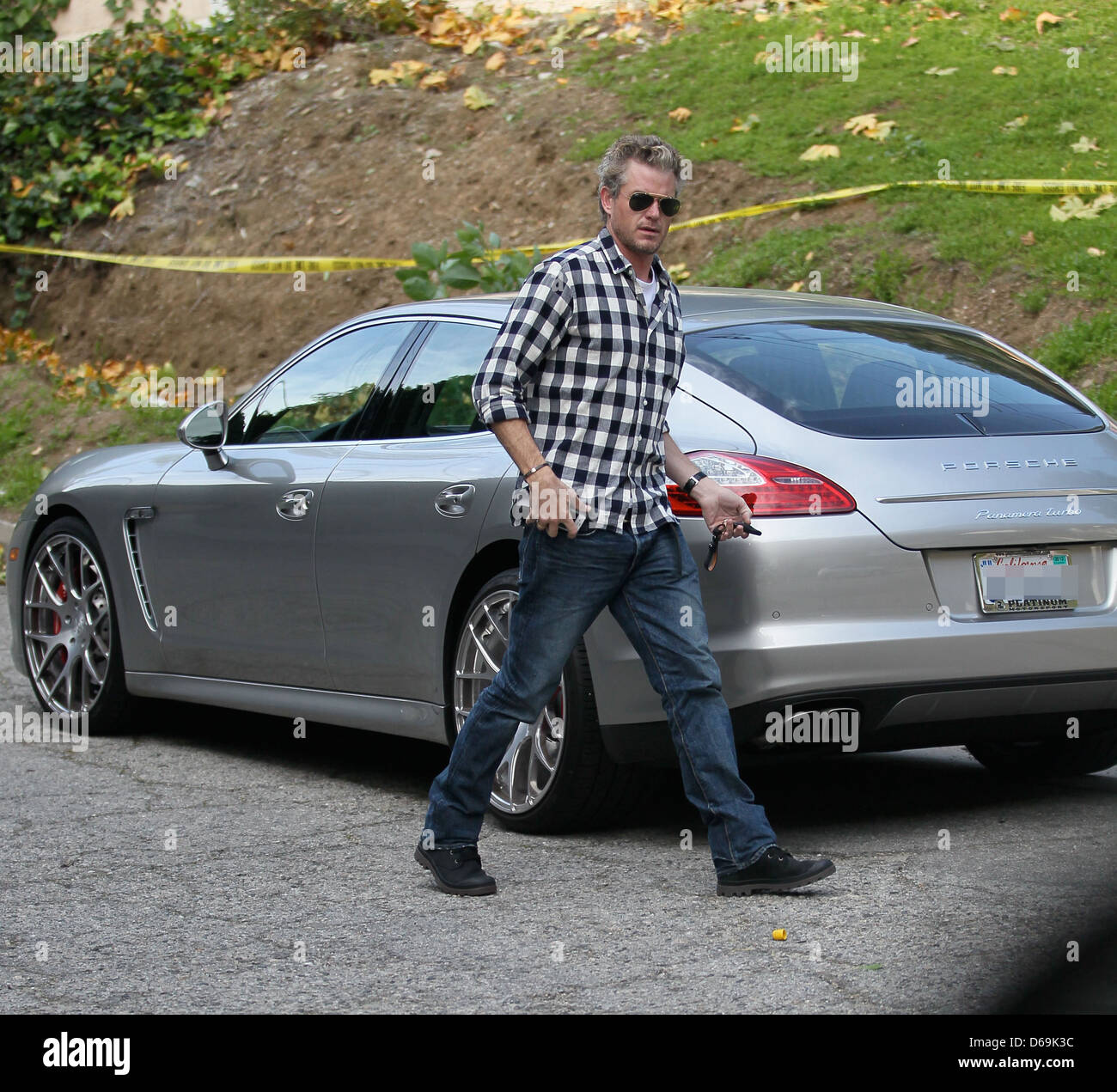 Eric Dane arrives home to find a large tree has fallen and smashed into ...