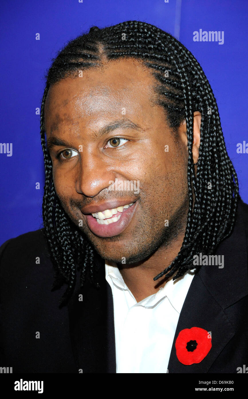 Former NHL player, Georges Laraque, signs his latest book 'The Story of ...