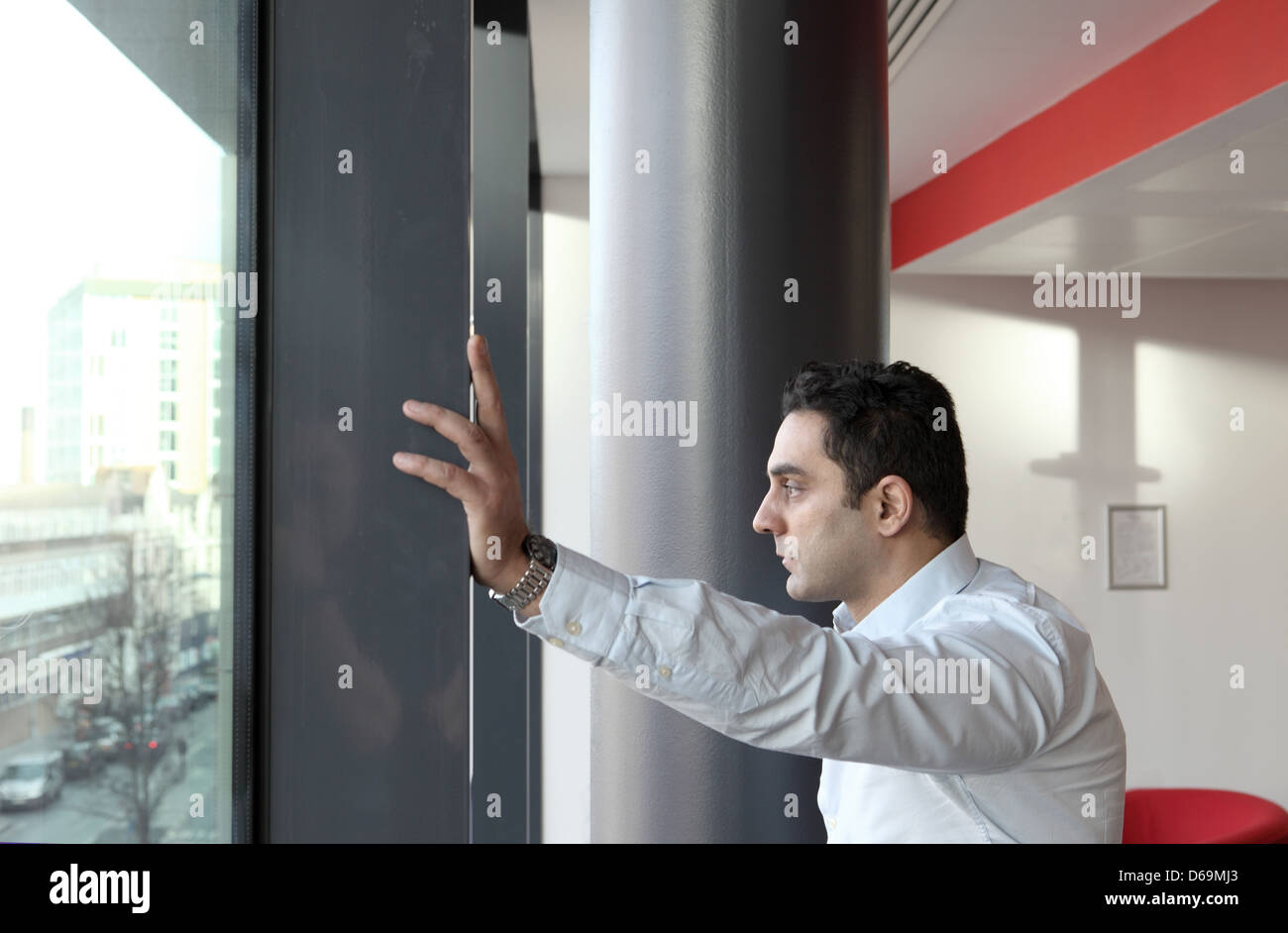 Person Looking Out Of Office Window High Resolution Stock Photography ...